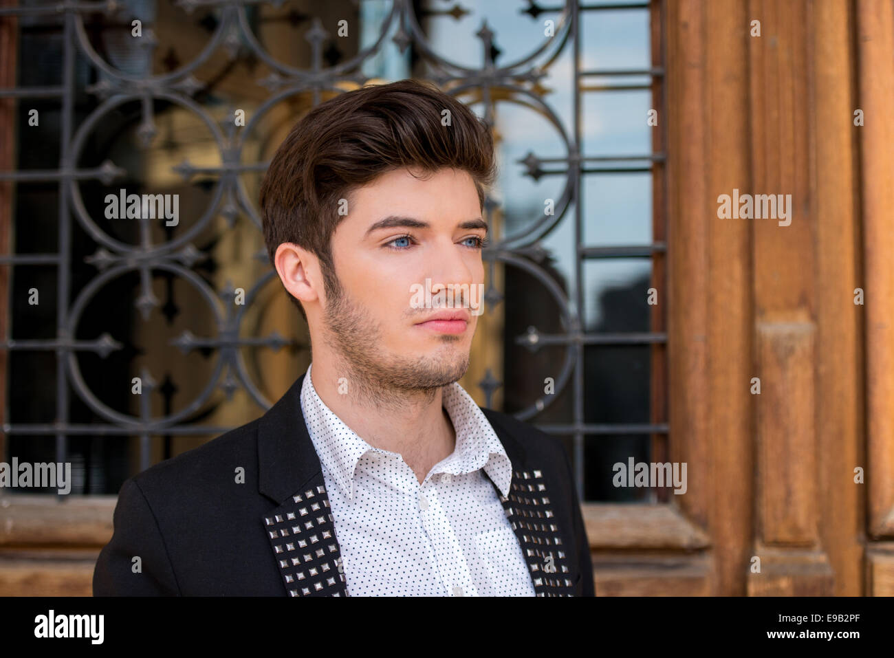 Portrait of an attractive pensive man with blue eyes Stock Photo - Alamy