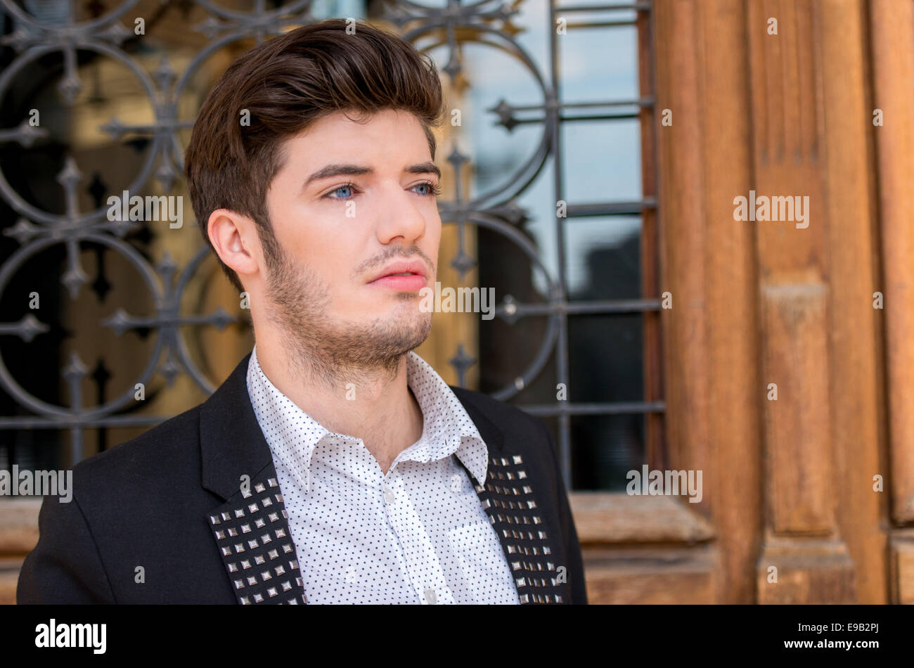 Blue eyed man looking away Stock Photo - Alamy