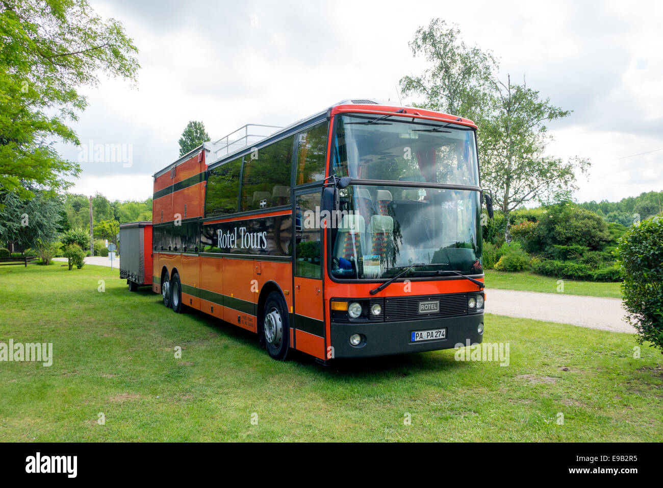 Rotel German double-decker tour bus and bike trailer parked at le ...