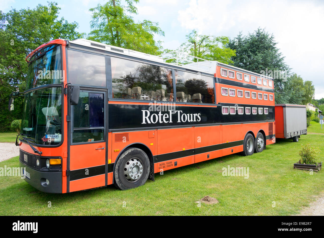 Rotel German double-decker tour bus and bike trailer parked at le ...