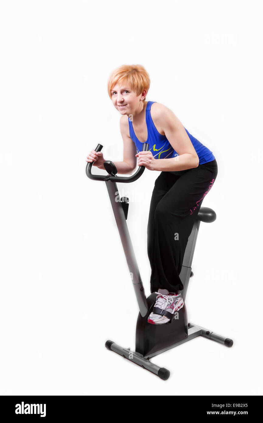 Woman exercise bike gym hi-res stock photography and images - Alamy