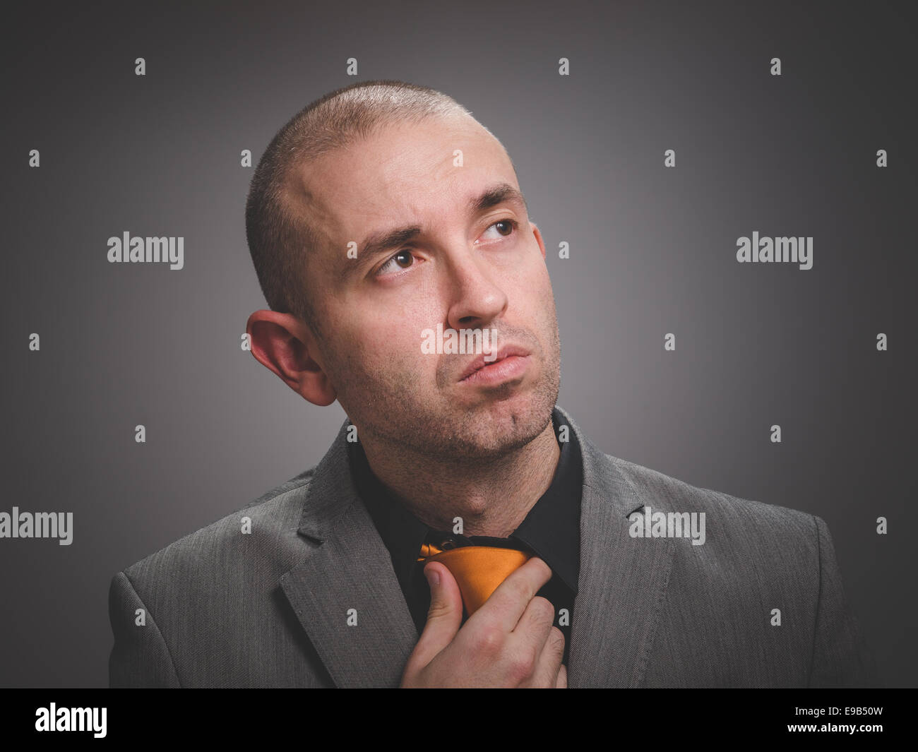 Interesting businessman portrait isolated on dark background Stock ...