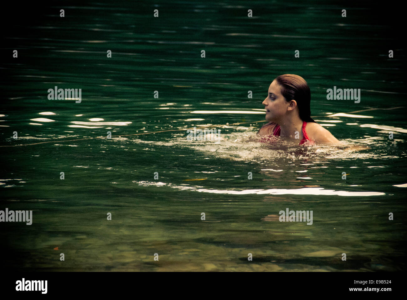 Woman swimming in a river near Palenque, Chiapas, Mexico Stock Photo ...