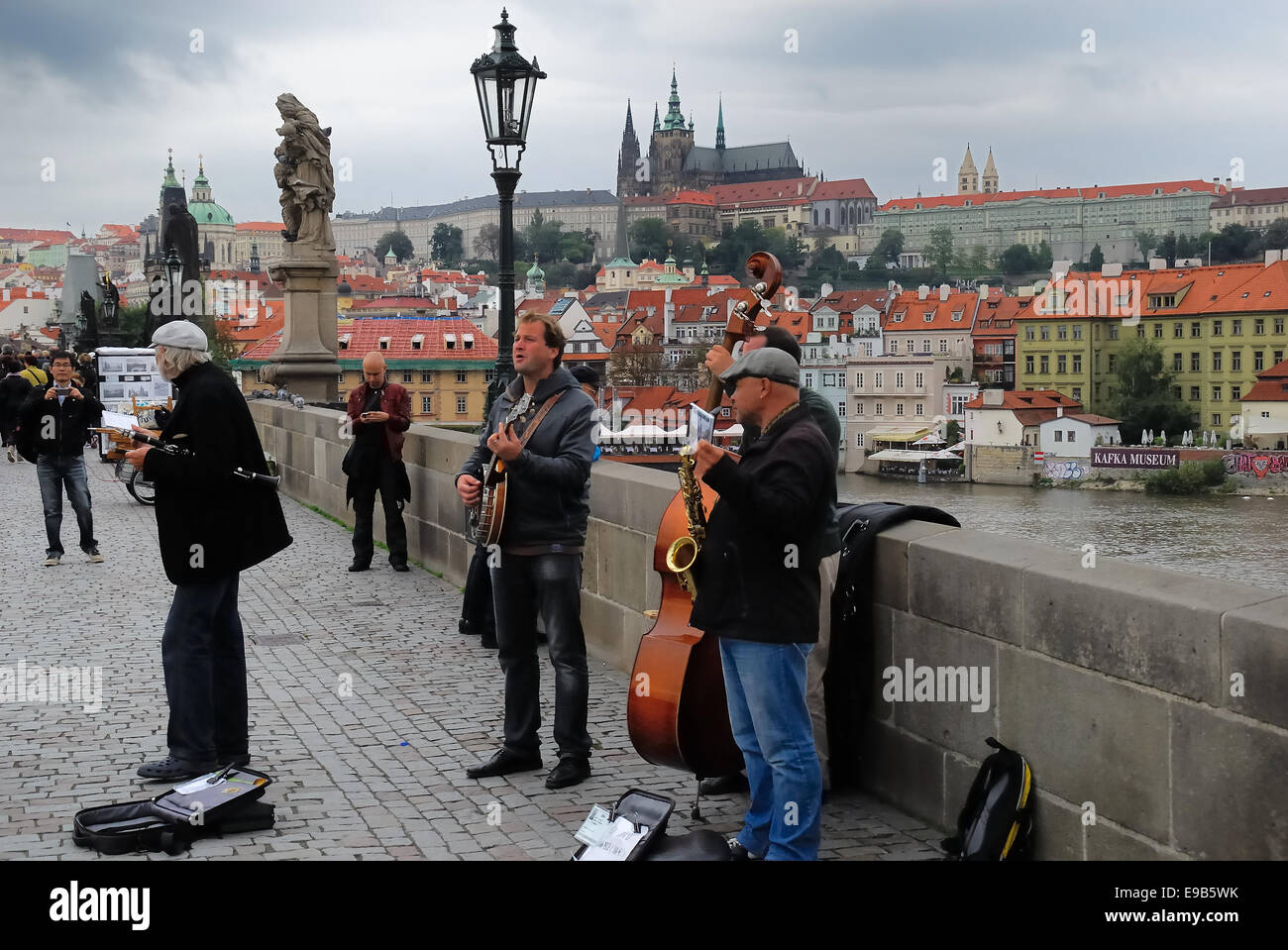 Street musicians in Prague Karluv Most, a street music band. Prague is ...