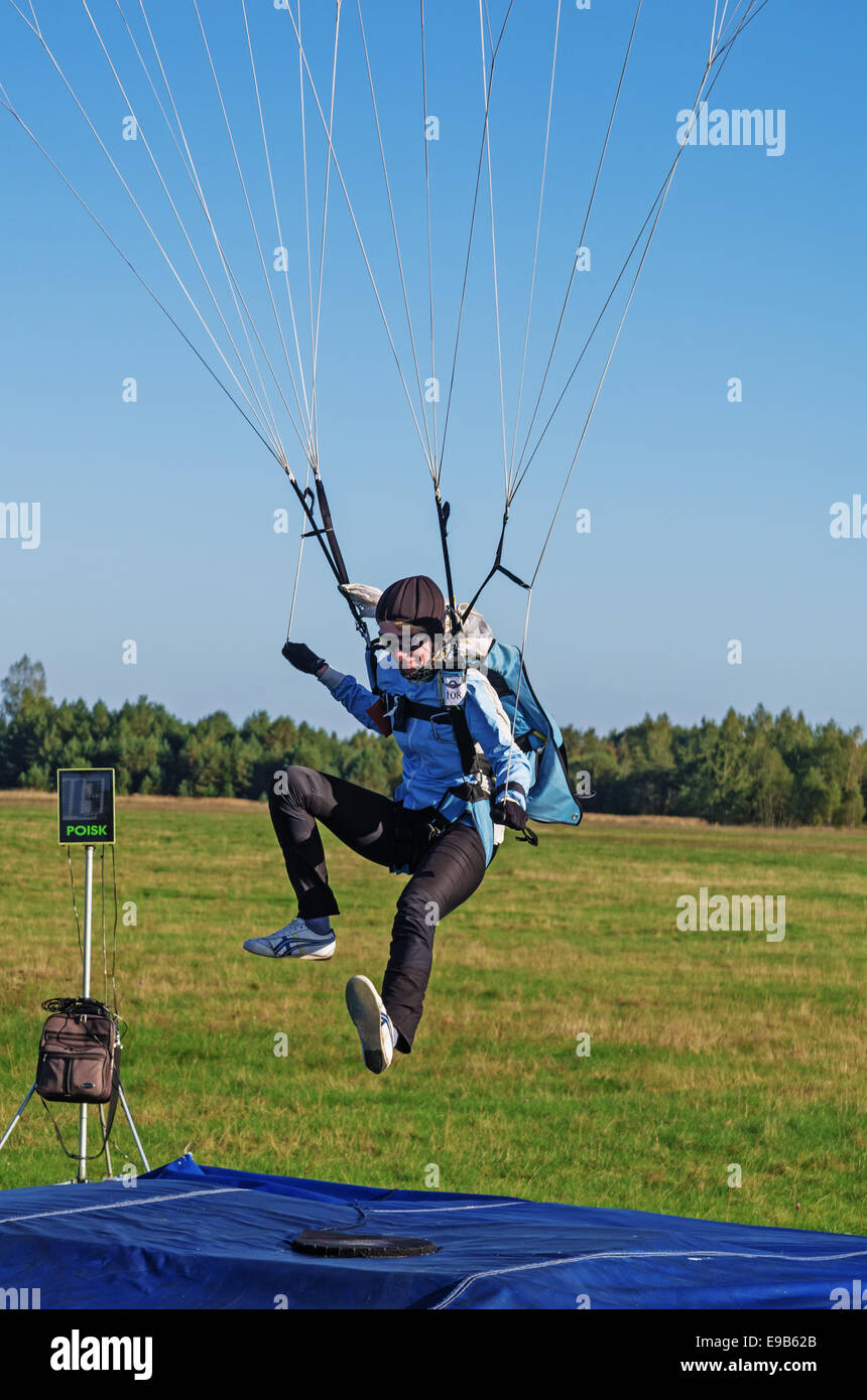 Female parachute jumper landing hi-res stock photography and images - Alamy
