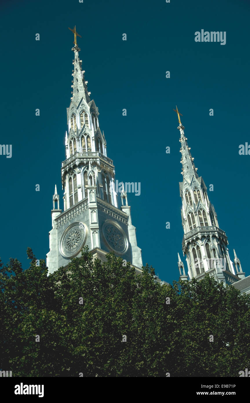 Twin peaks, two silver spires, jut from Ottawa's Notre Dame Cathedral ...