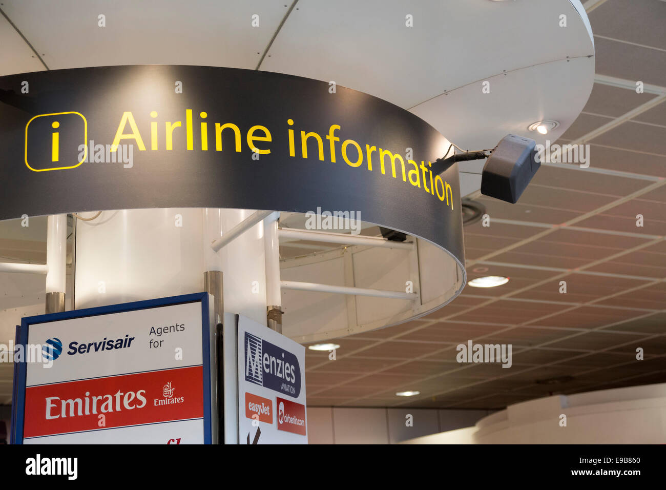 Airline information desk at Gatwick Airport, London Stock Photo - Alamy