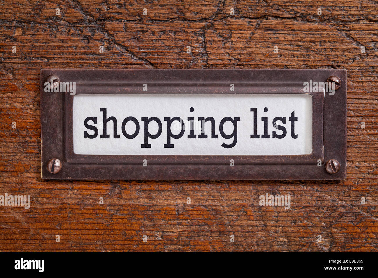shopping list - file cabinet label, bronze holder against grunge and ...