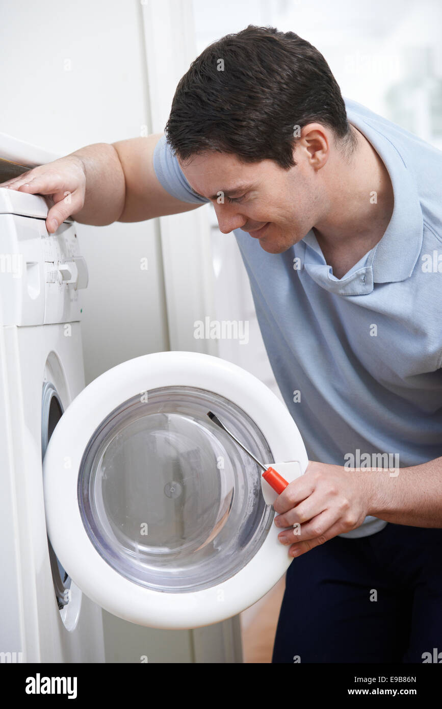 Fixing interior washing machine hi-res stock photography and images - Alamy