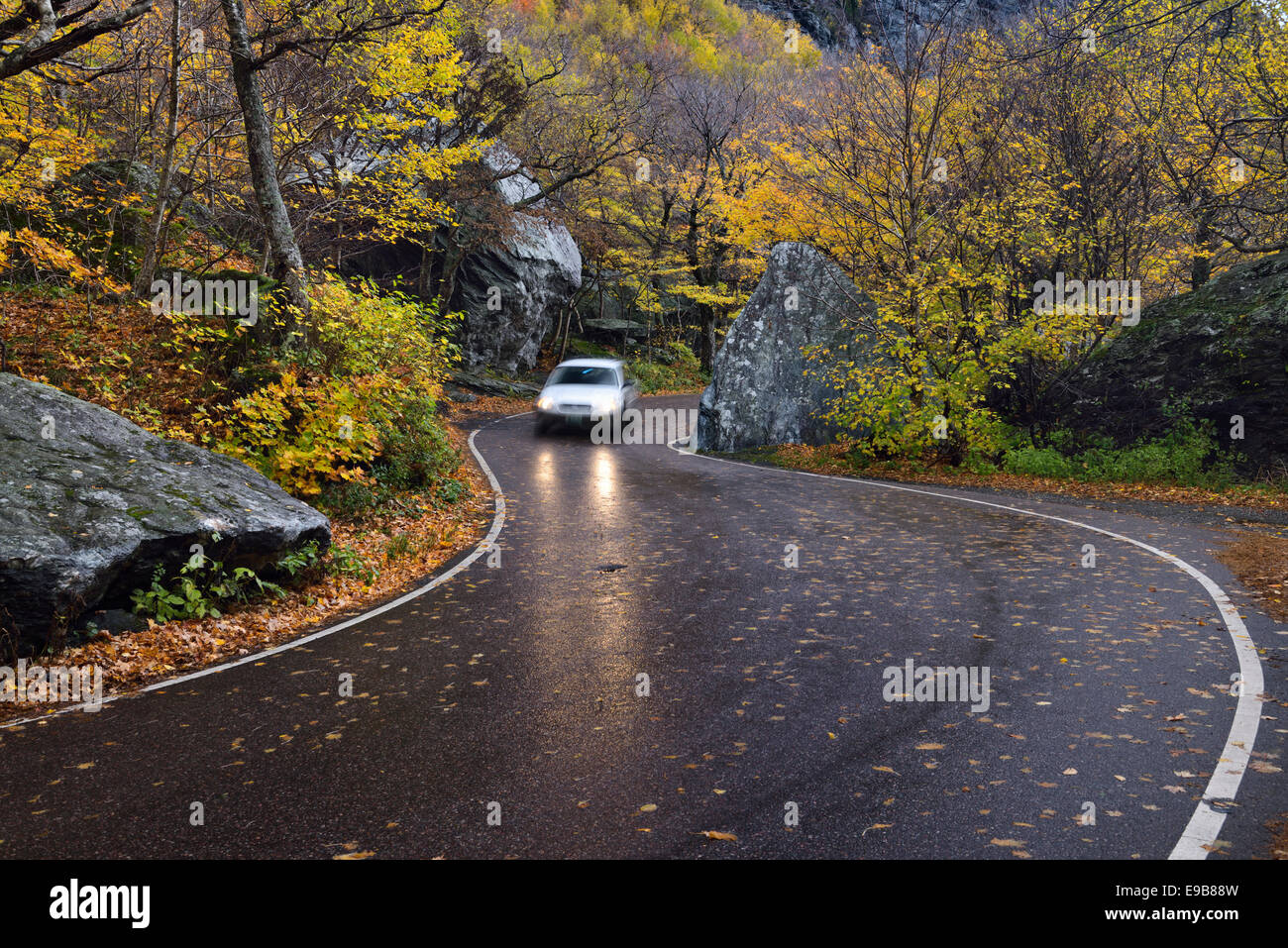 Car driving down winding road hi-res stock photography and images - Alamy