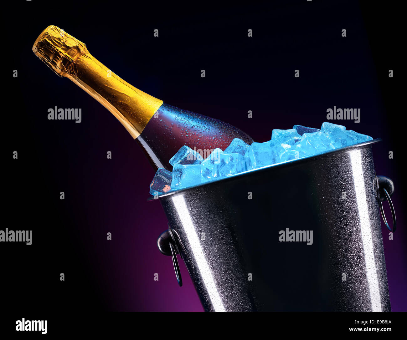 luxury bottle of champagne in Metal ice bucket with ice cubes Stock ...