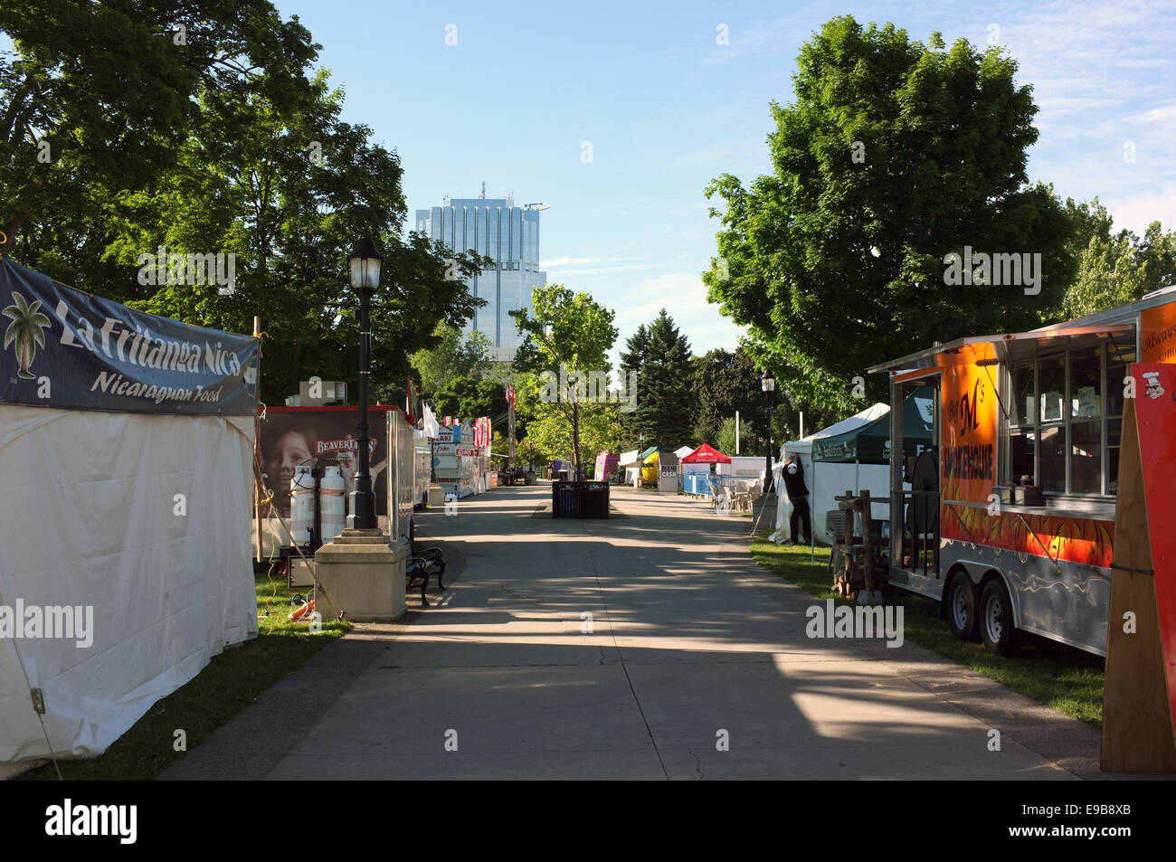 An avenue of food vendors in a downtown park Stock Photo - Alamy
