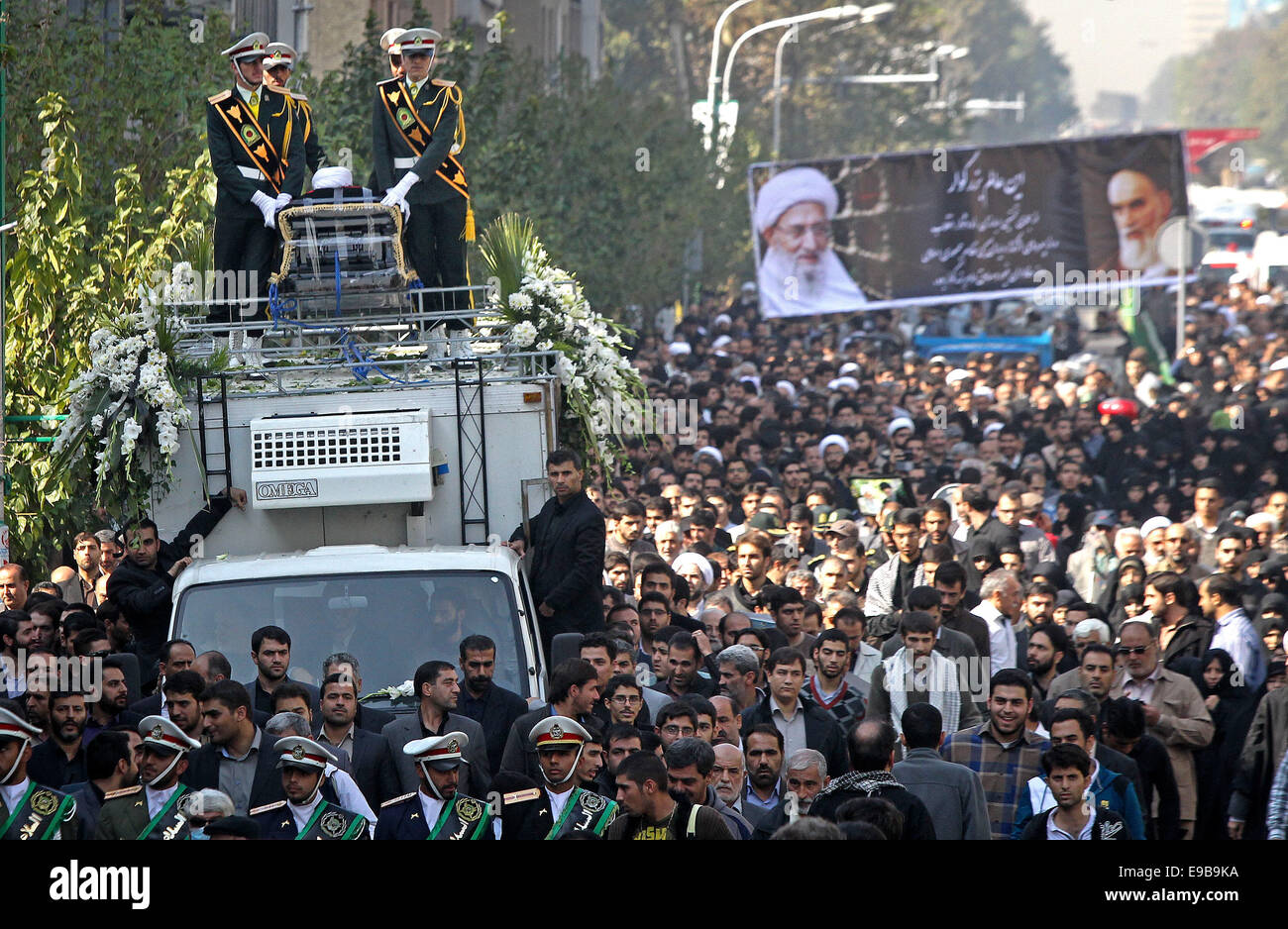 Tehran, Iran. 23rd Oct, 2014. People attend a funeral ceremony of ...