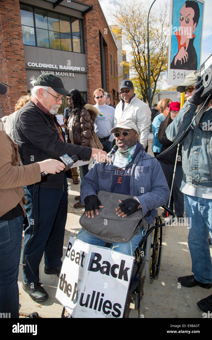 Birmingham, Michigan - People picket the office of David Trott, a ...