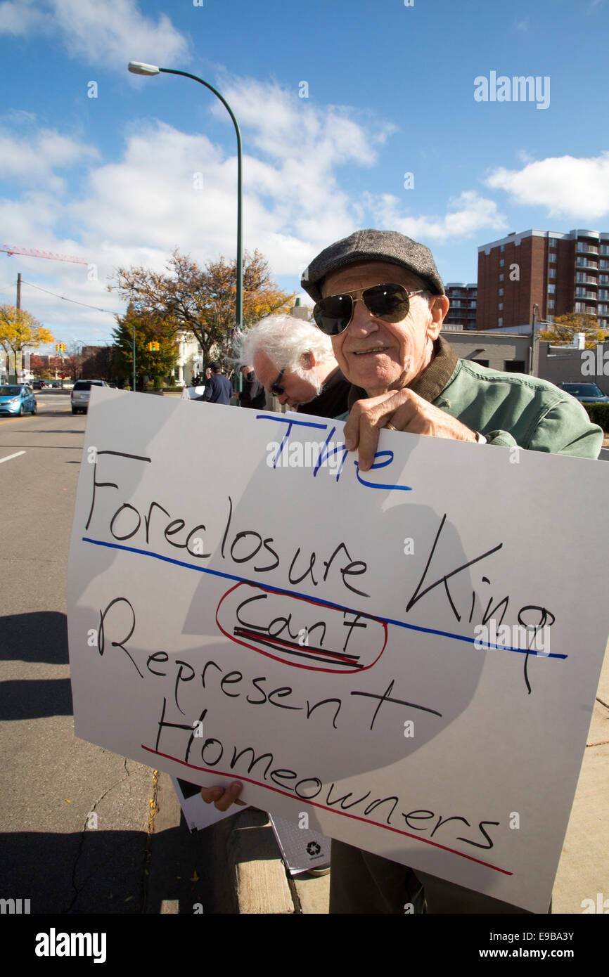 Birmingham, Michigan - People picket the office of David Trott, a ...