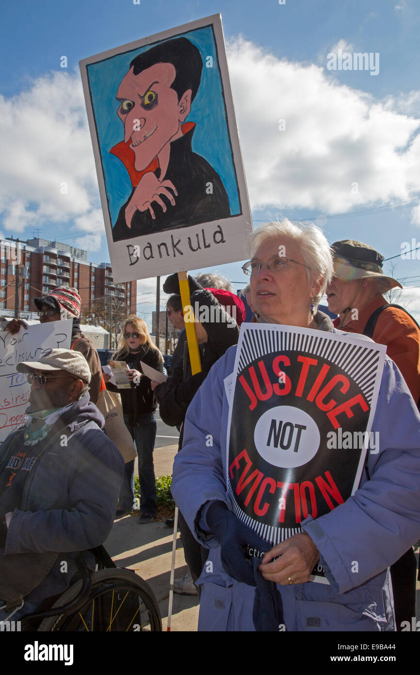 Birmingham, Michigan - People picket the office of David Trott, a ...