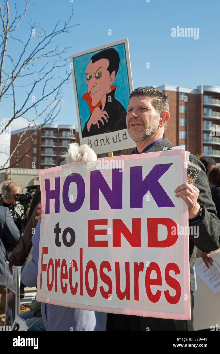 Birmingham, Michigan - People picket the office of David Trott, a ...