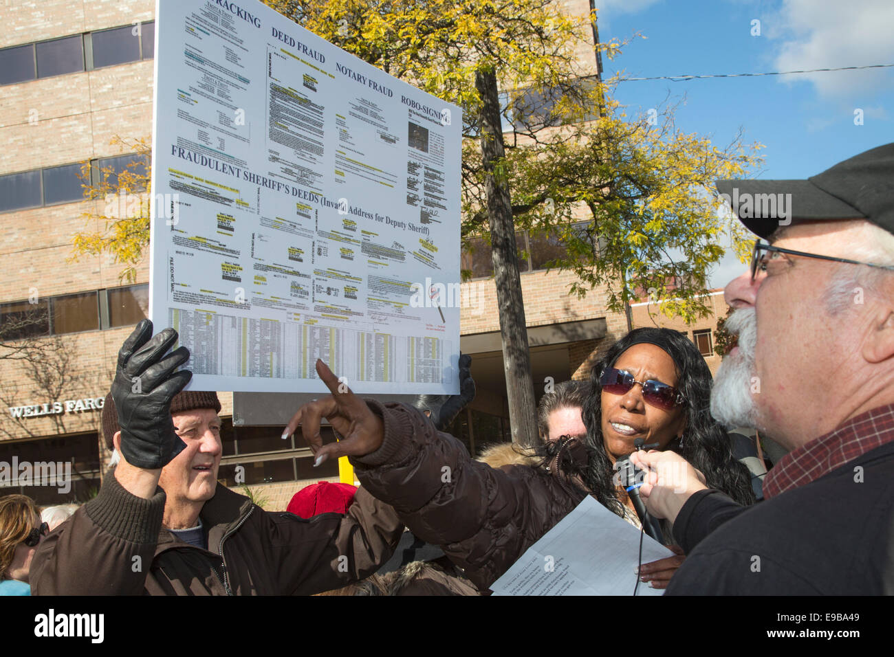 Birmingham, Michigan - People picket the office of David Trott, a ...