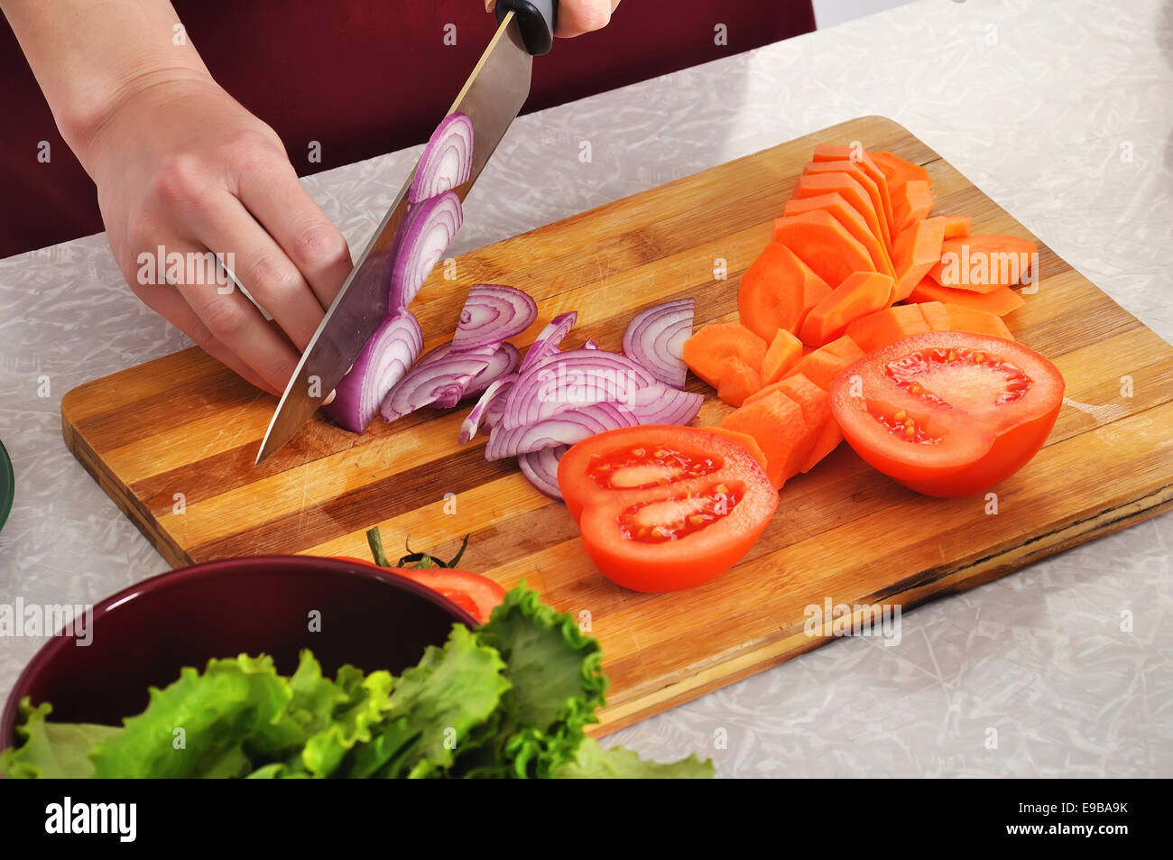human hands cooking onion in kitchen Stock Photo - Alamy
