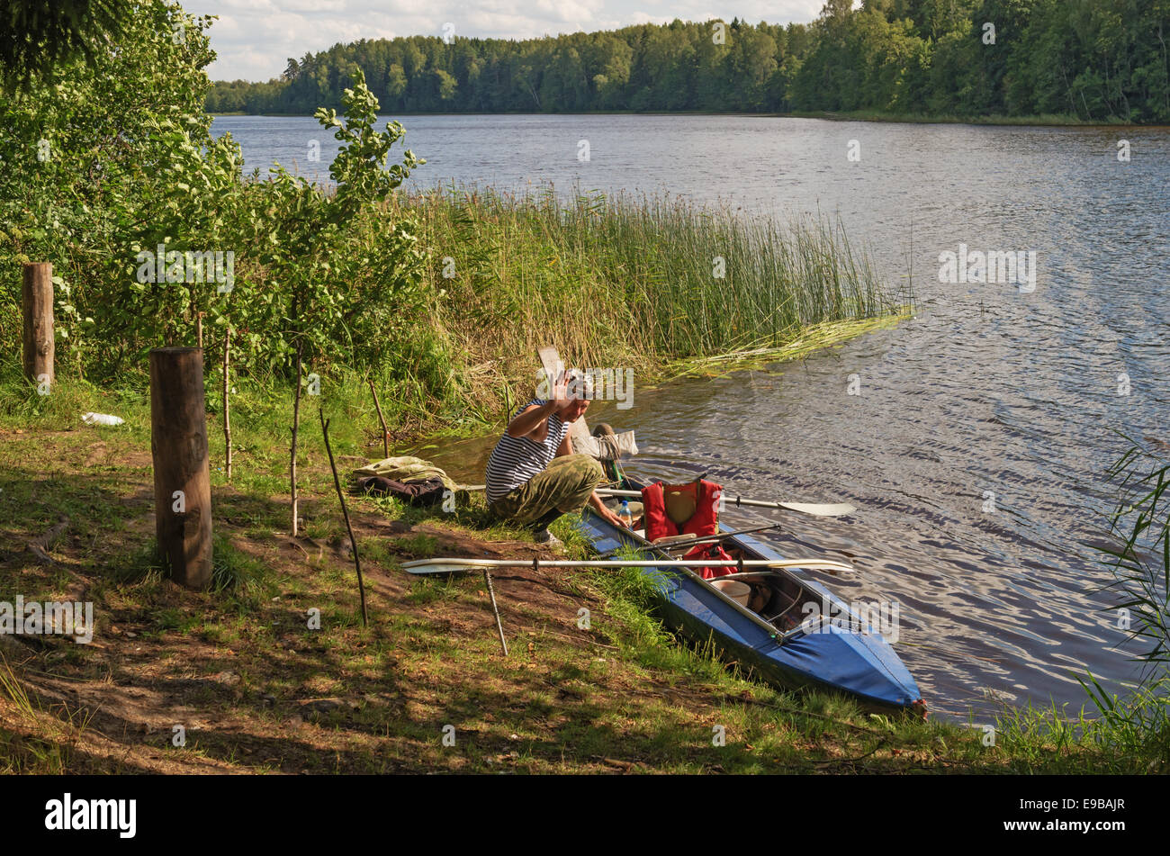 Summer lake landscape. Canoe travel Stock Photo - Alamy