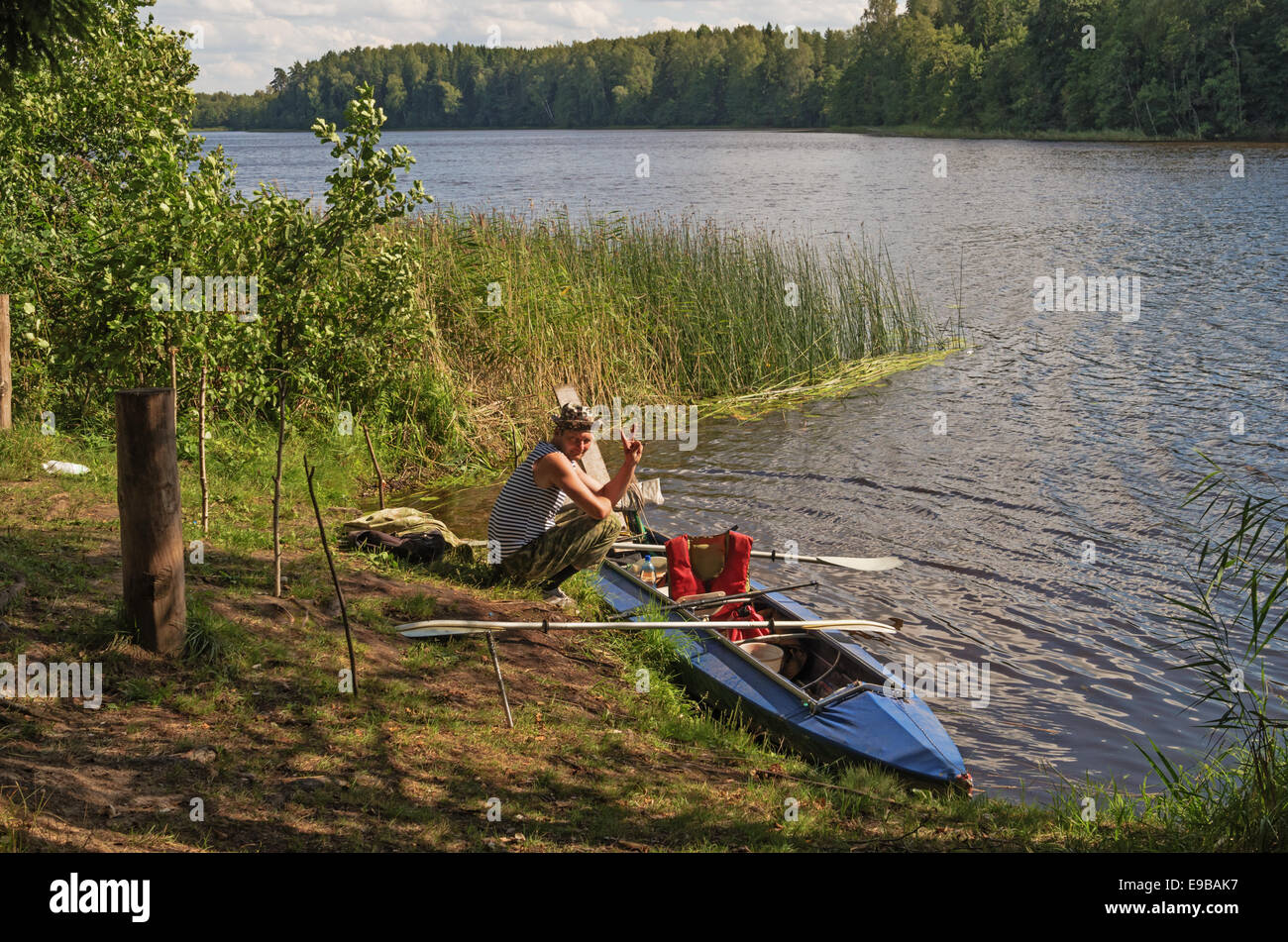 Summer lake landscape. Canoe travel Stock Photo - Alamy