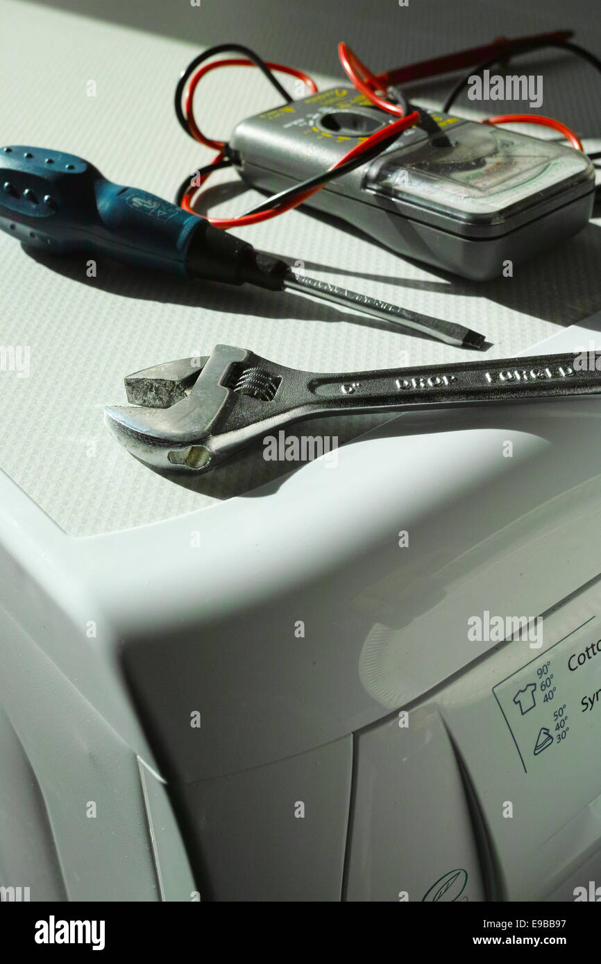 Washing machine repair hi-res stock photography and images - Alamy