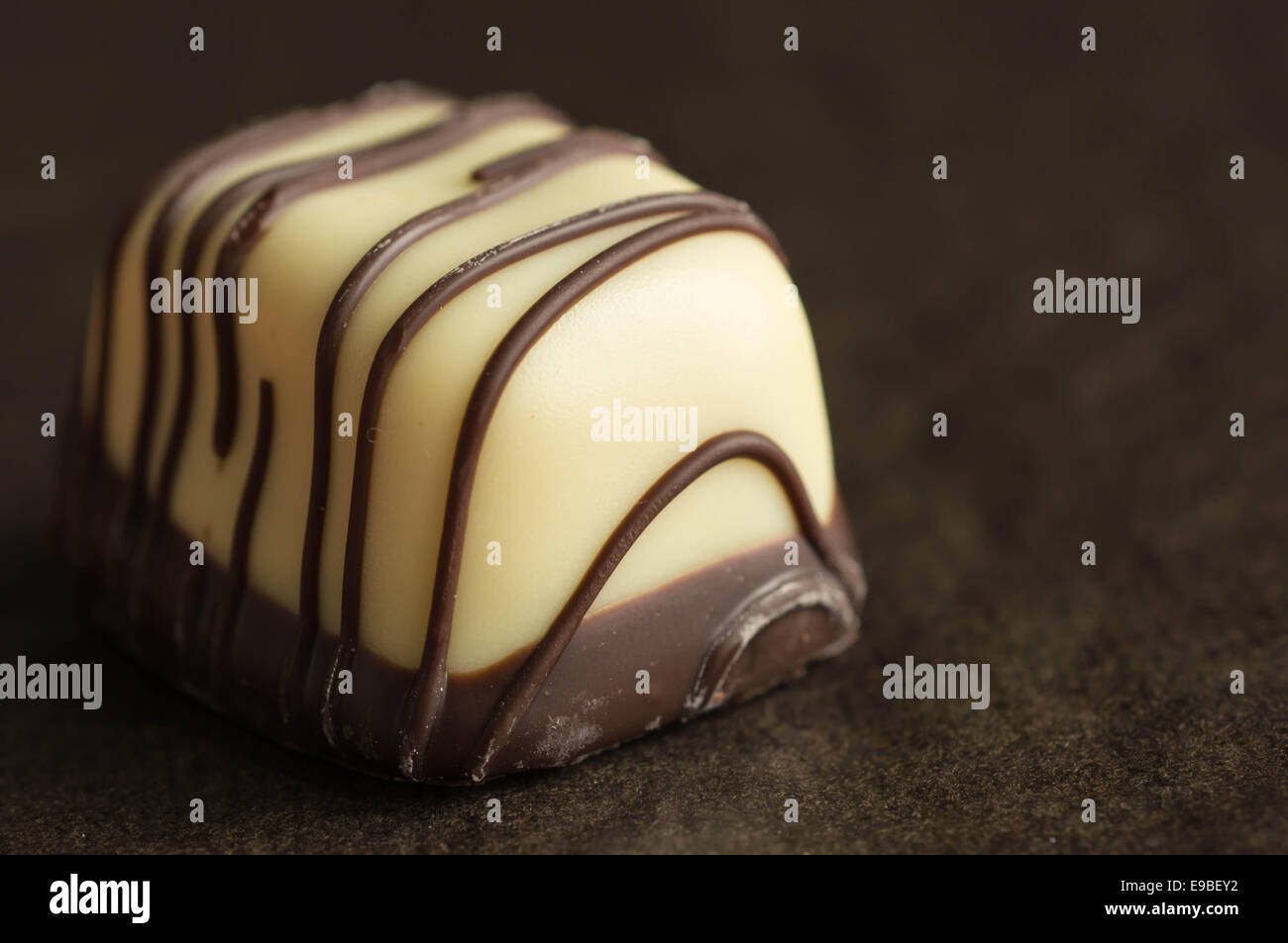 Candy from dark and light chocolate close up Stock Photo - Alamy