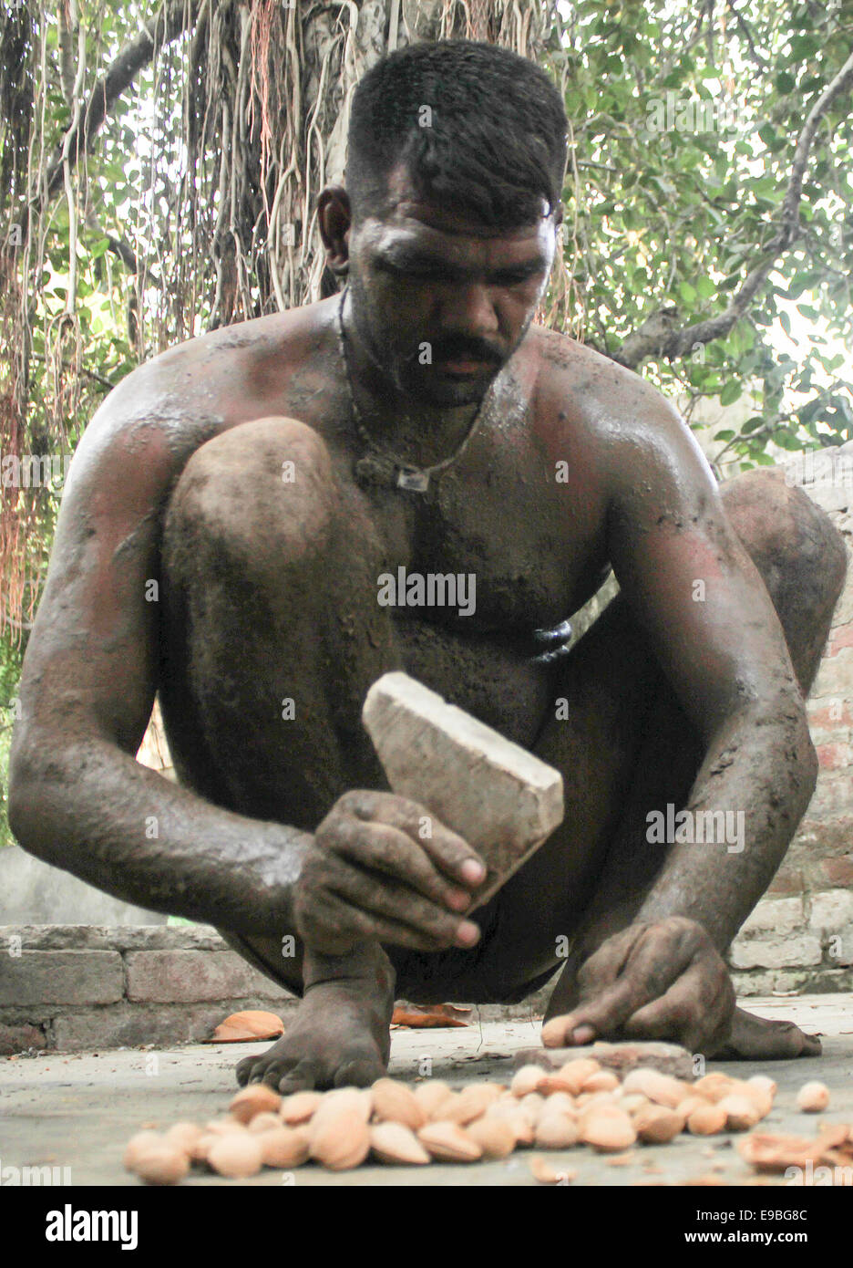 Pakistani Traditional wrestlers or "Pehalwans" are busy practicing at ...
