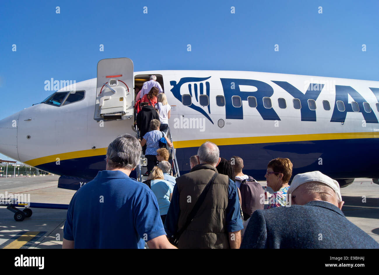 Passenger boarding a Ryanair plane in Murcia airport Spain Stock Photo ...