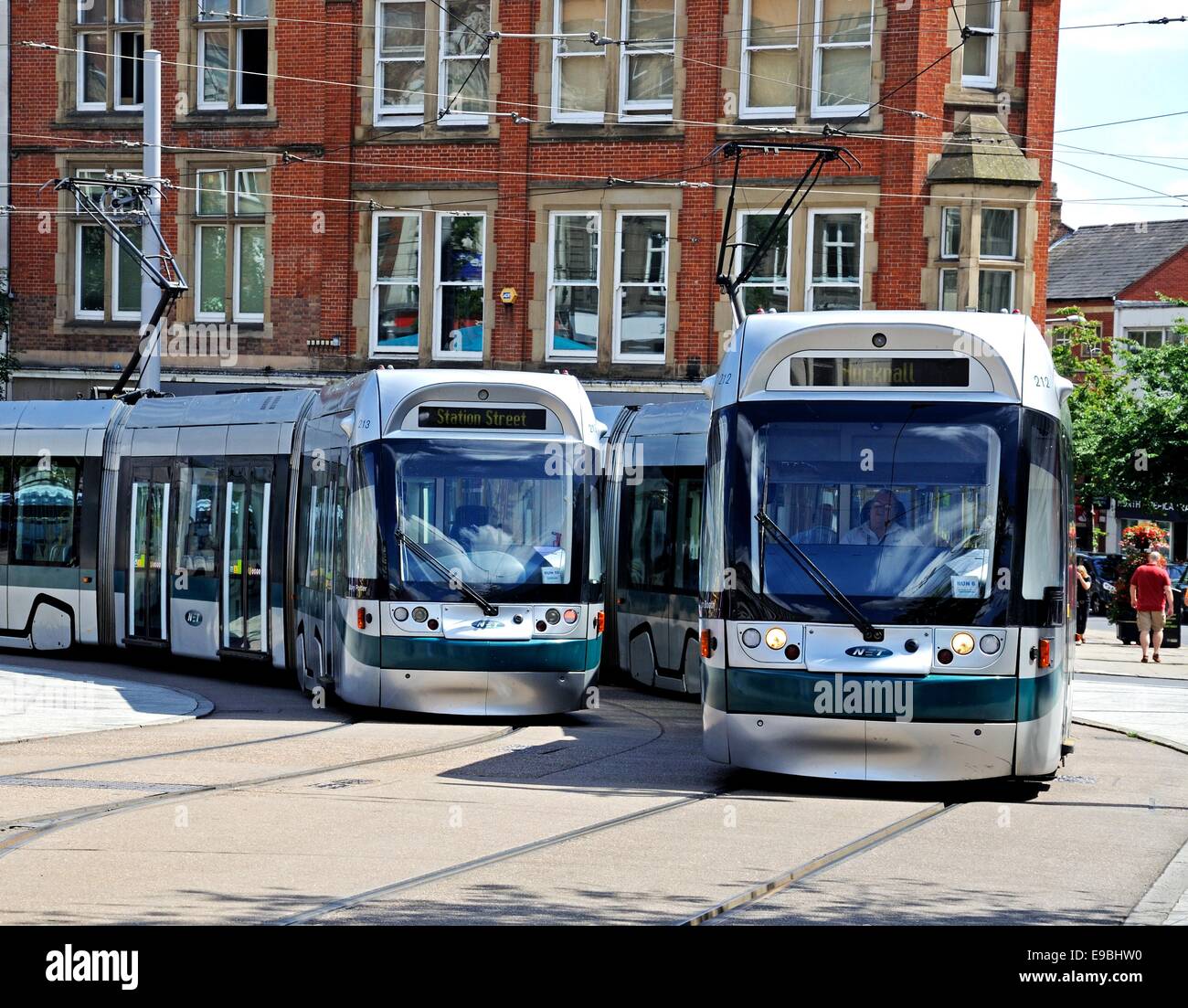 Modern trams travelling round the Old Market Square, Nottingham ...