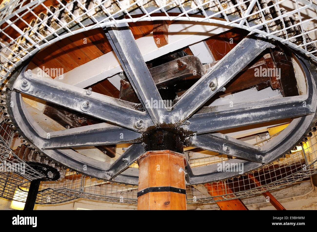 Part of the grindstone mechanism inside the mill stone floor of a flour ...