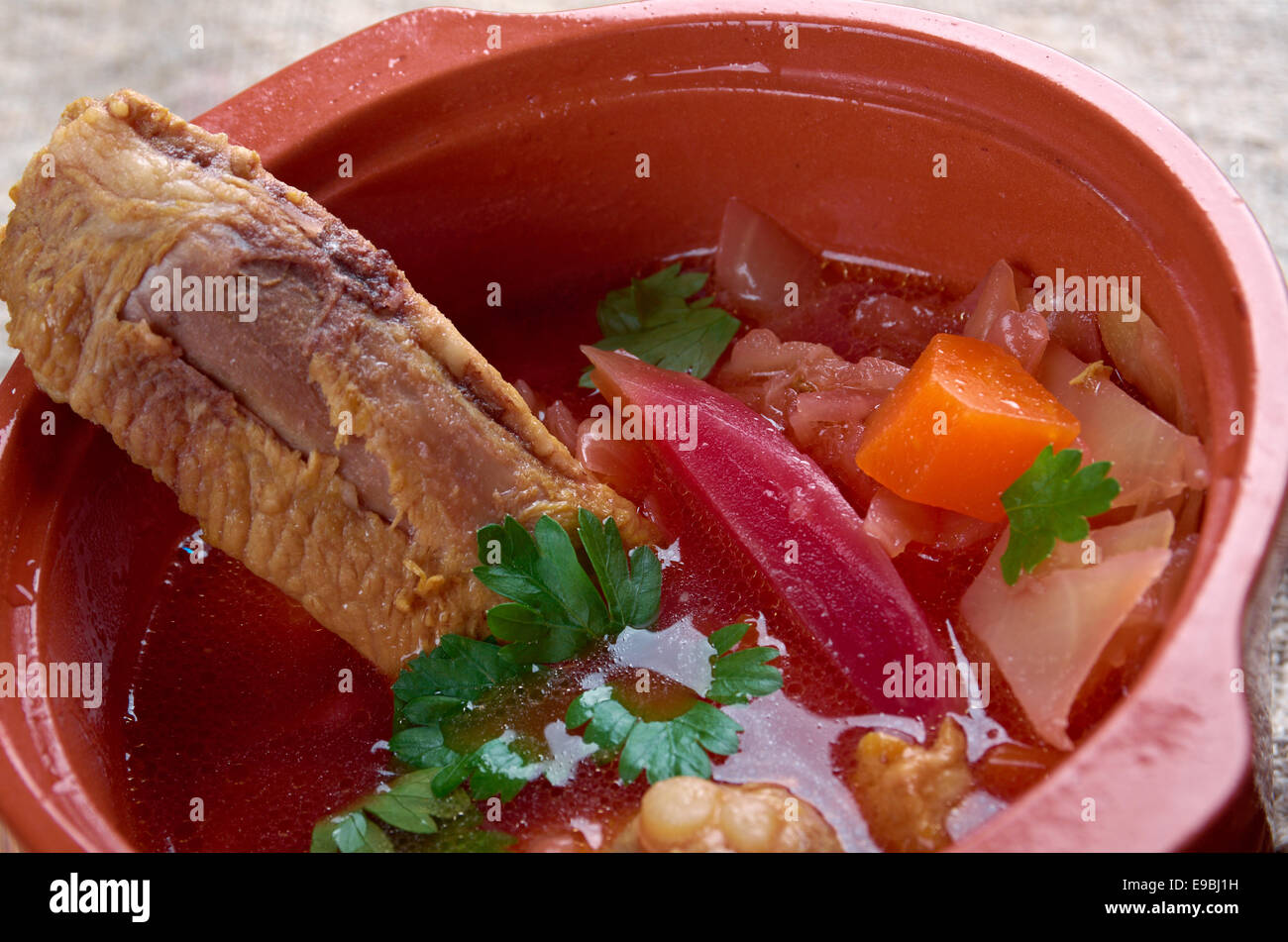 Eastern European beet soup with pork belly Stock Photo - Alamy