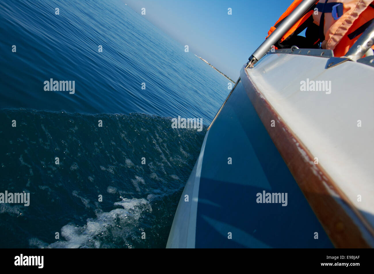 Water wake behind yacht yacht Stock Photo - Alamy