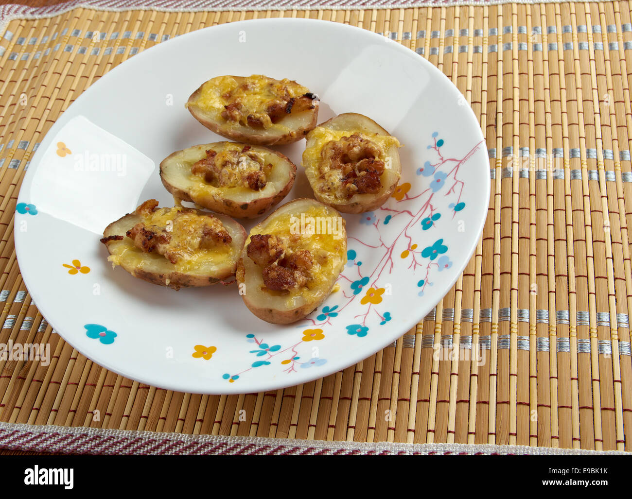 patate ripiene al forno - Italian stuffed potato Stock Photo - Alamy