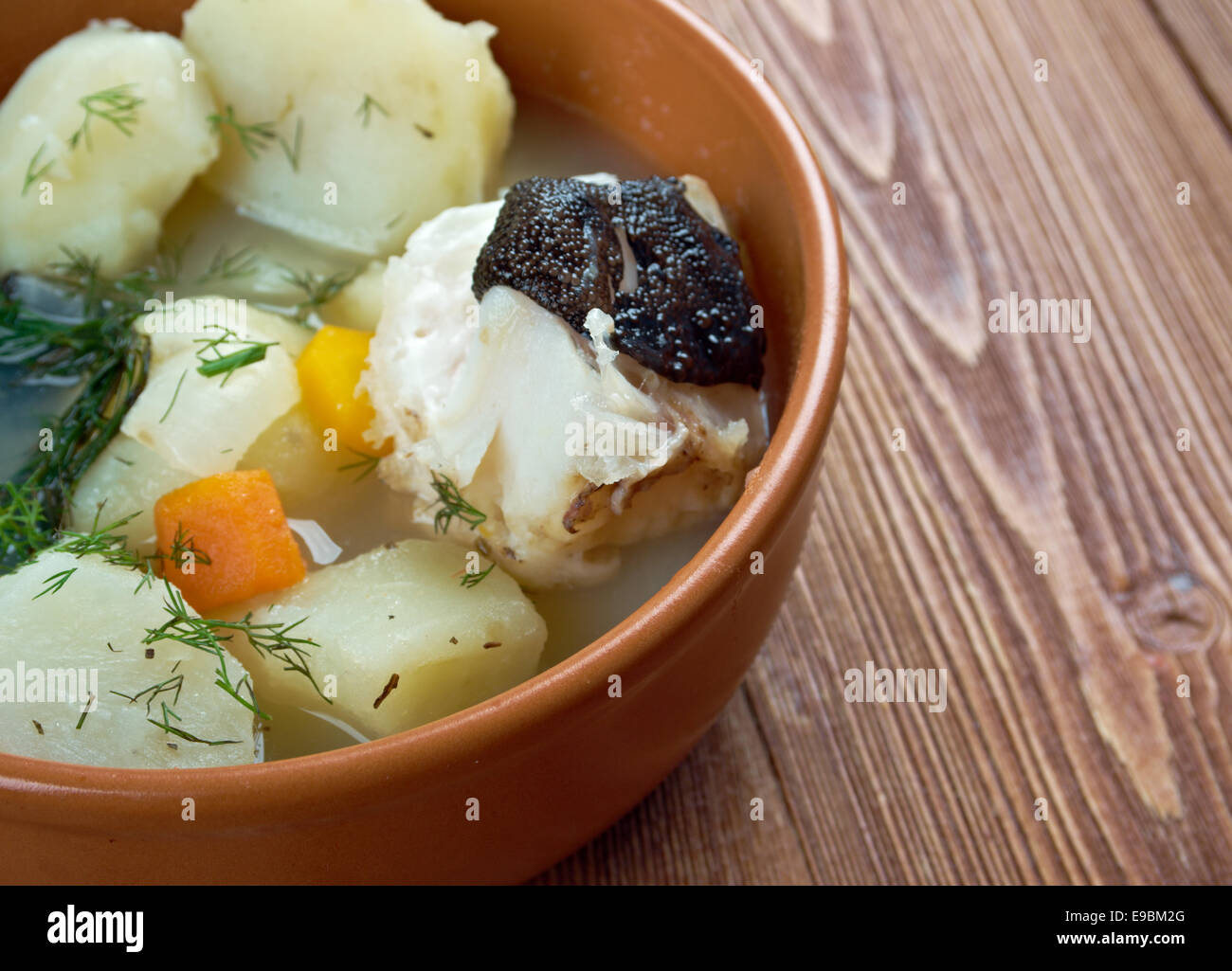 stew fresh northern catfish with potato Stock Photo - Alamy