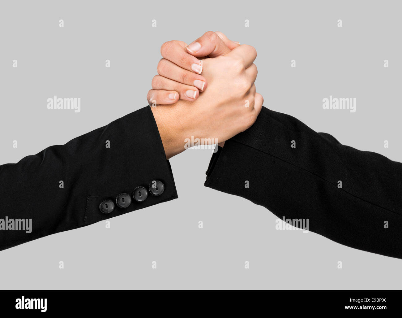 Greeting hands over a gray background Stock Photo - Alamy