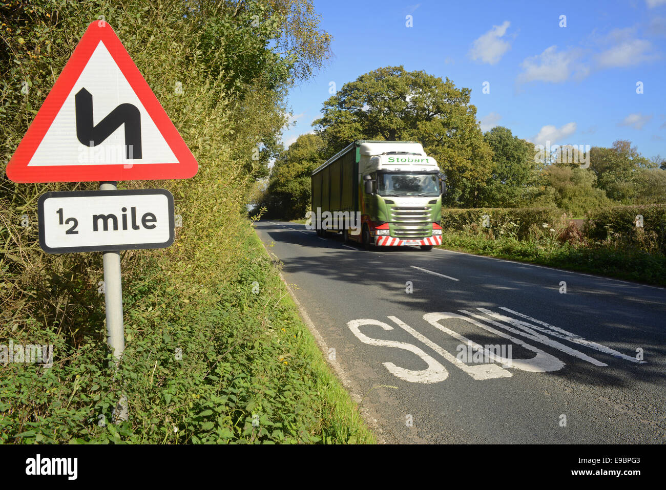 lorry passing sharp bend warning sign for half a mile ahead yorkshire ...