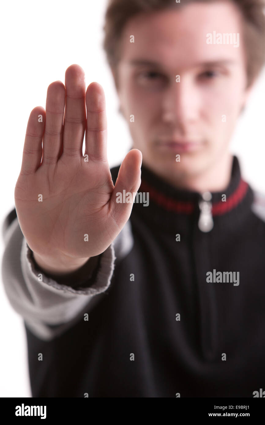 young adult stopping you with a raised hand Stock Photo - Alamy