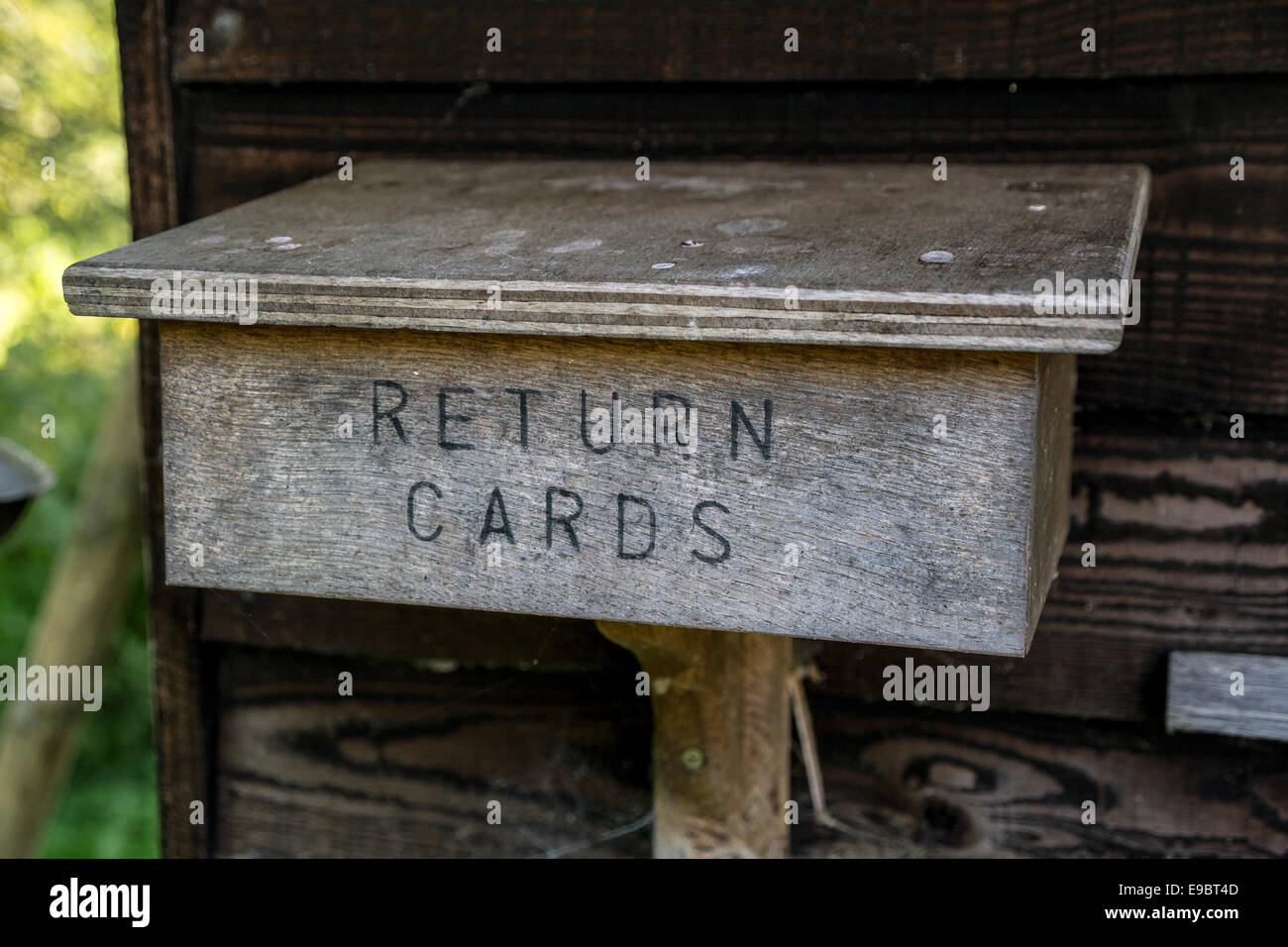 Return card box on fishing hut, River Test, Hampshire, England Stock ...