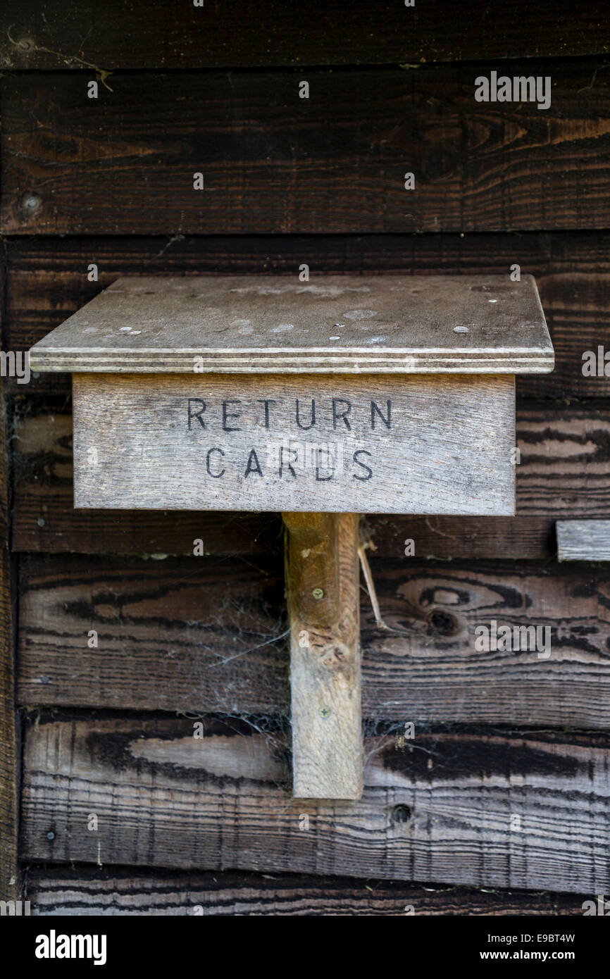 Return card box on fishing hut, River Test, Hampshire, England Stock ...