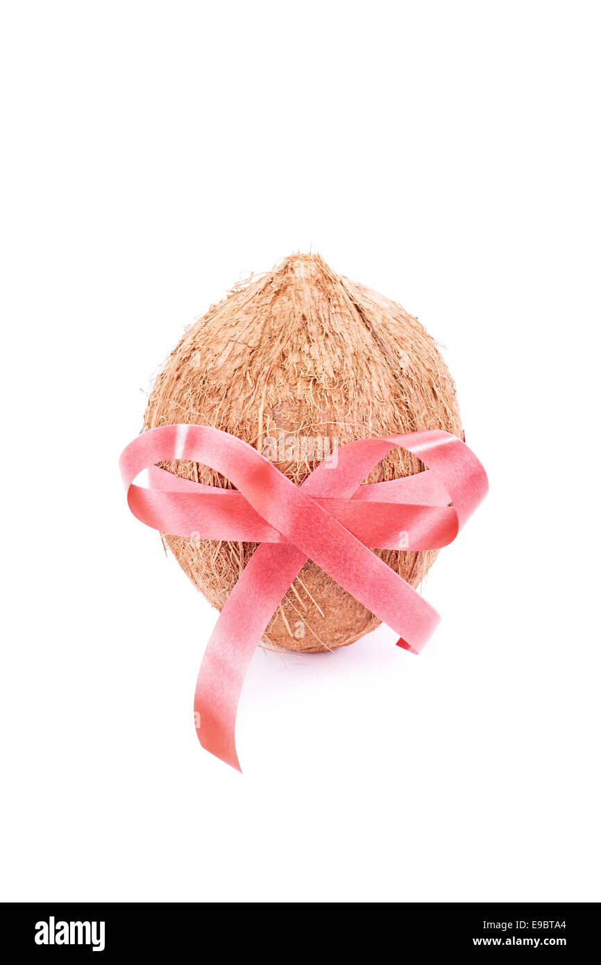 Coconut wrapped with red ribbon, isolated on white background Stock ...