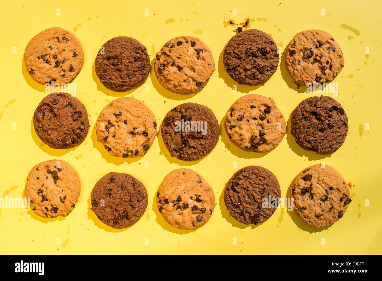 Biscuits on yellow background. Day light Stock Photo - Alamy