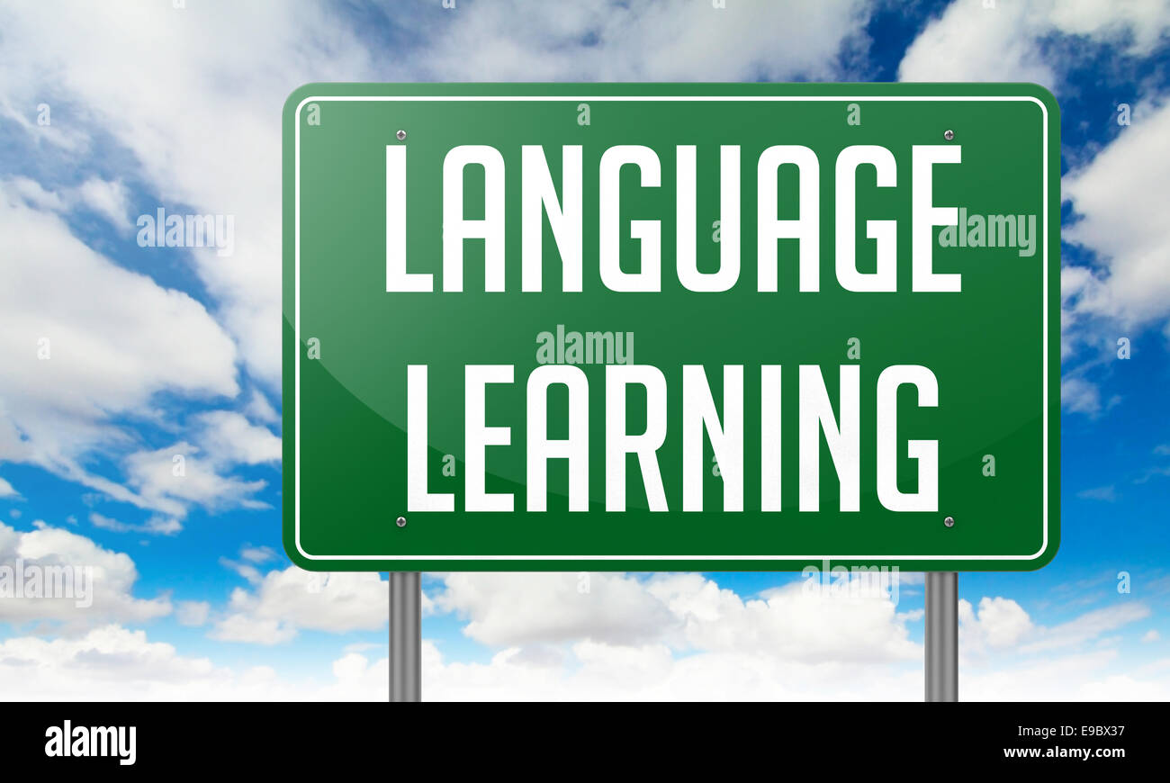 Language Learning on Green Highway Signpost Stock Photo - Alamy
