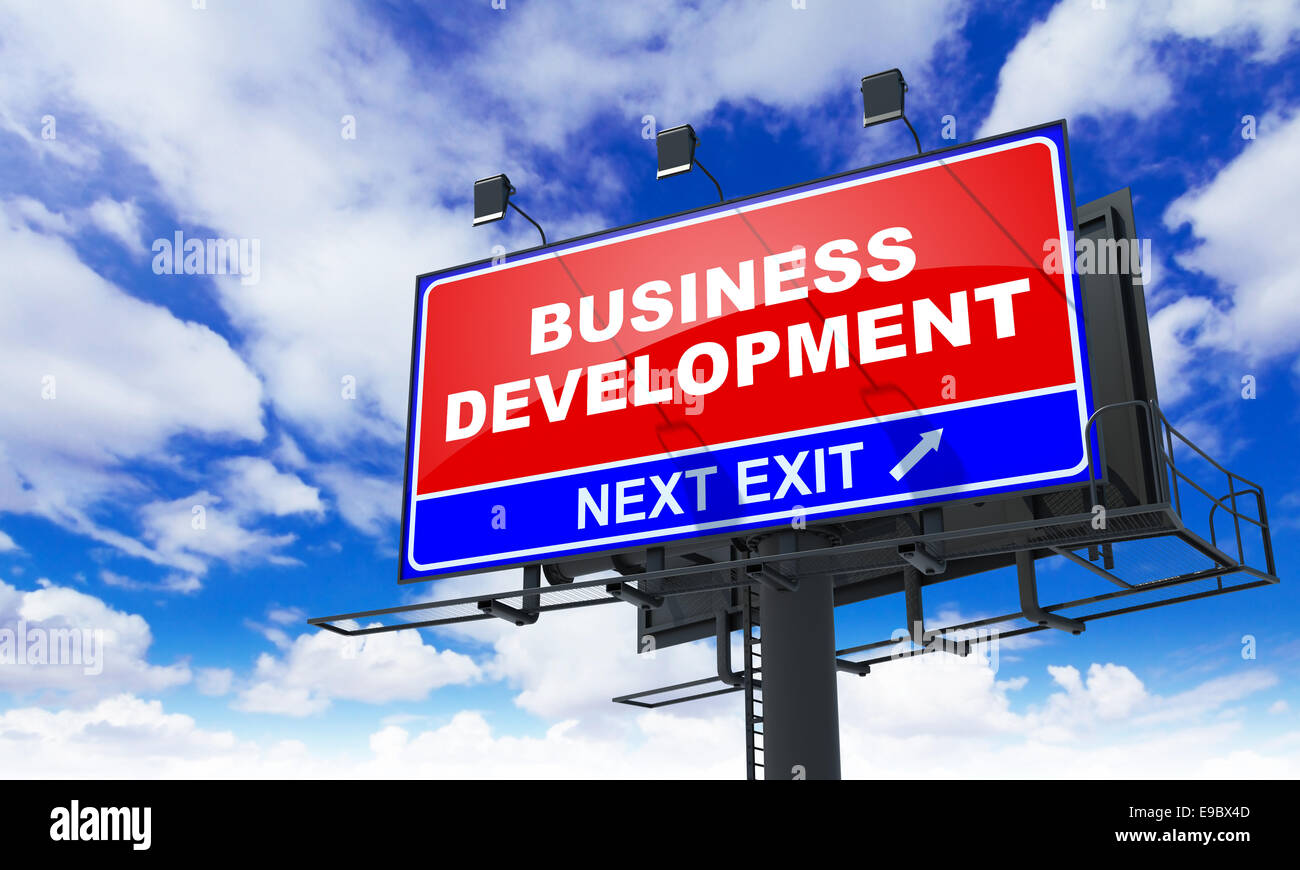 Business Development Inscription on Red Billboard Stock Photo - Alamy