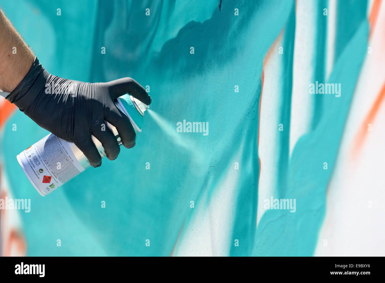 Human hand painting a graffiti Stock Photo - Alamy