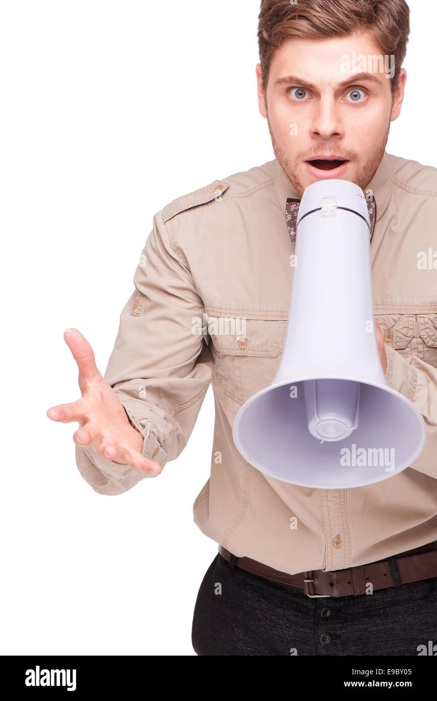 Angry businessman screaming with loud-speaker Stock Photo - Alamy