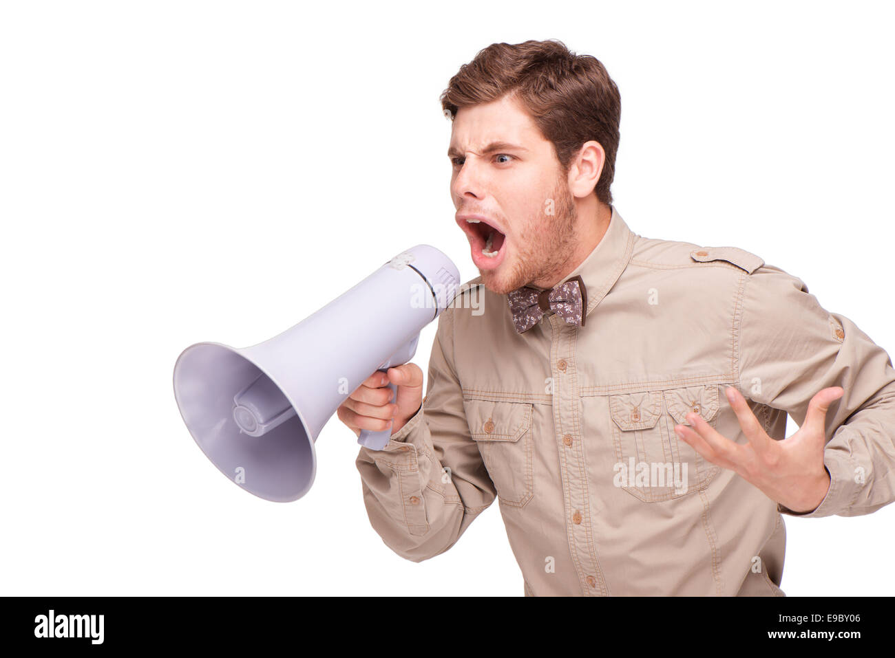 Angry businessman screaming with loud-speaker Stock Photo - Alamy