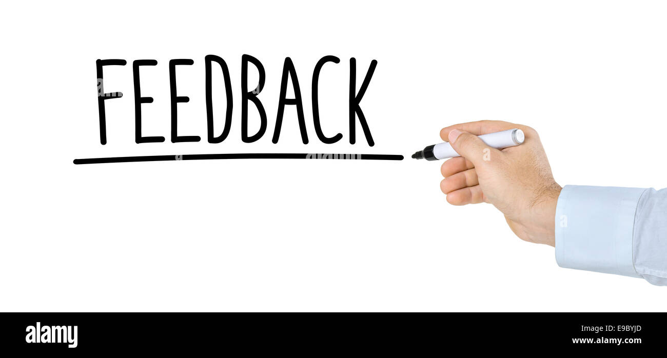 Hand with pen writing the word Feedback Stock Photo - Alamy