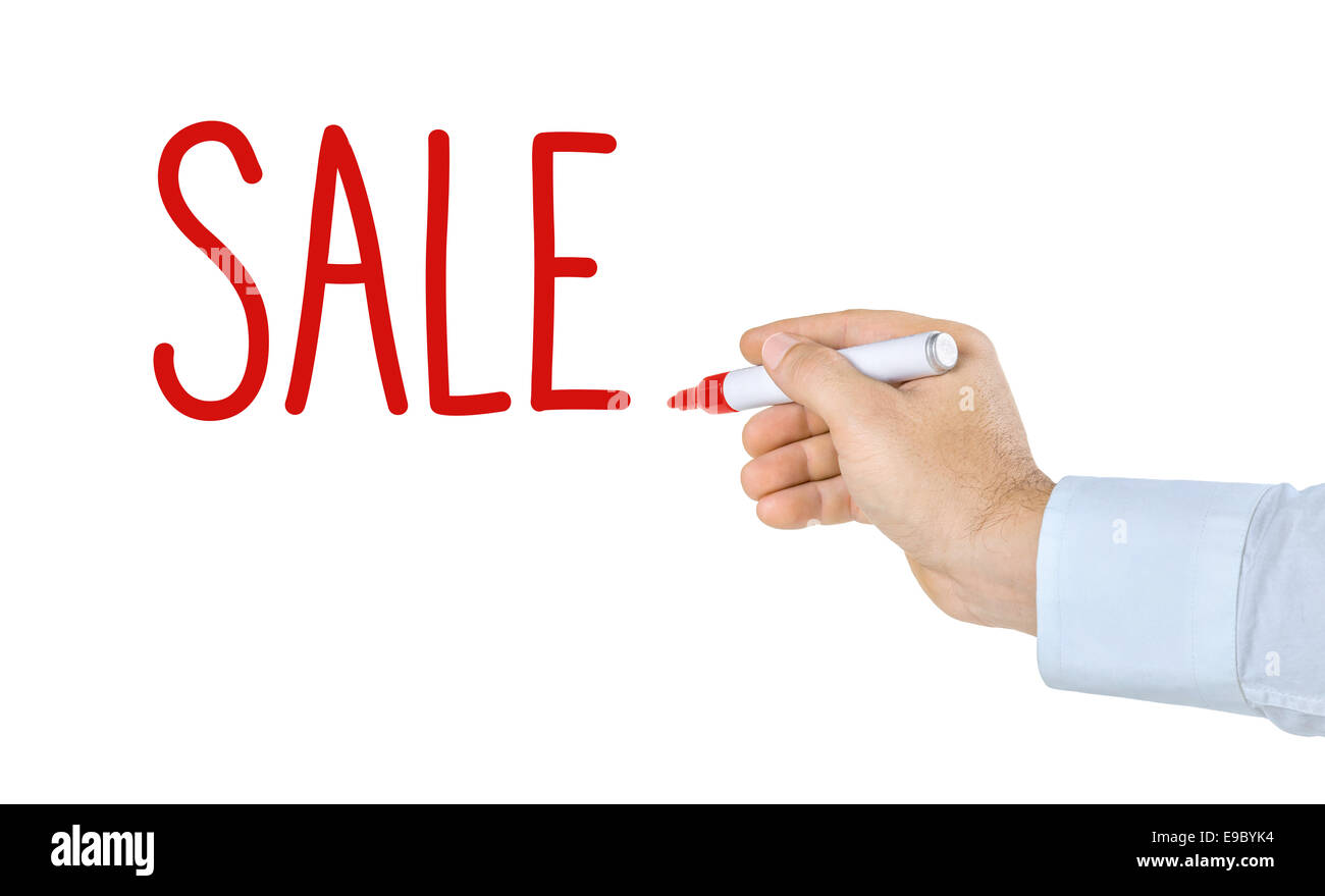 Hand with pen writing the word Sale Stock Photo - Alamy