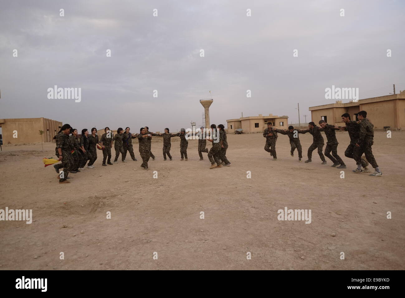 Kurdish fighters of the People's Protection Units YPG and female ...